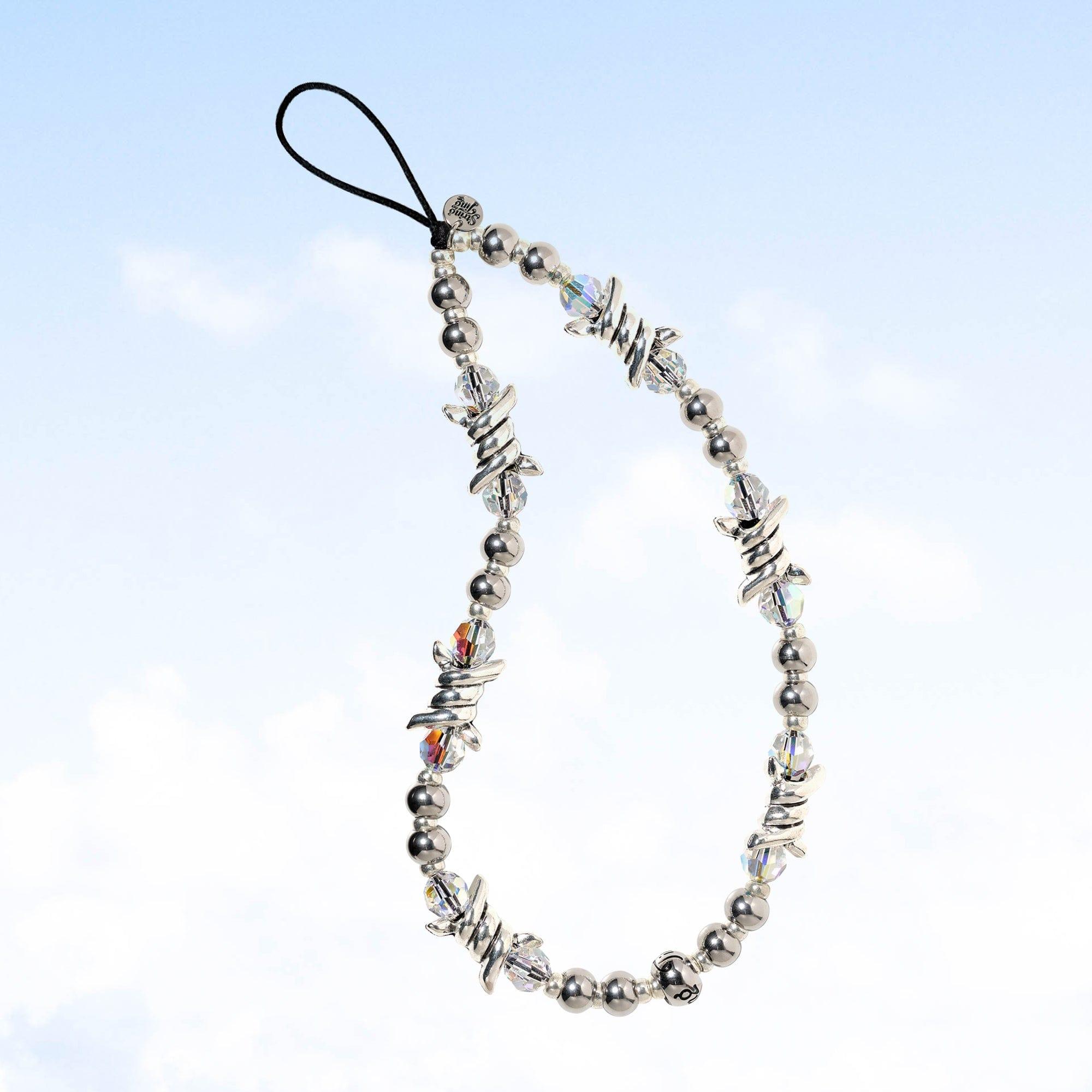 The Barb Wristlet Phone Strap – String Ting London